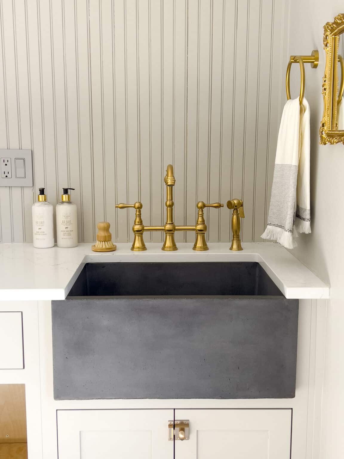A bespoke laundry room in 1-2-3 using a NativeStone sink